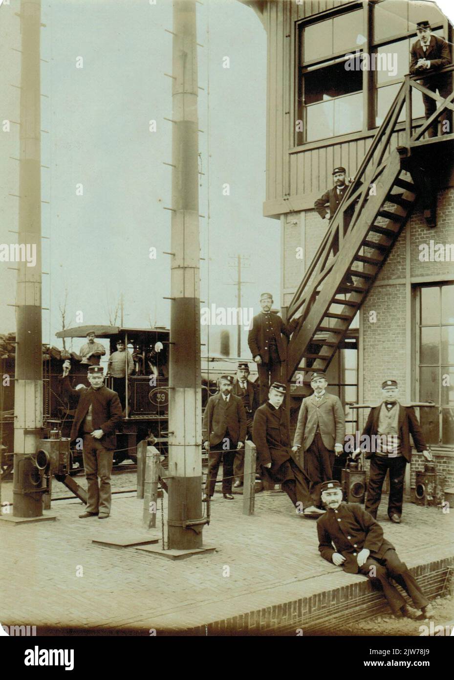 Image of the station staff of the S.S. station Lage Zwaluwe, posing at ...