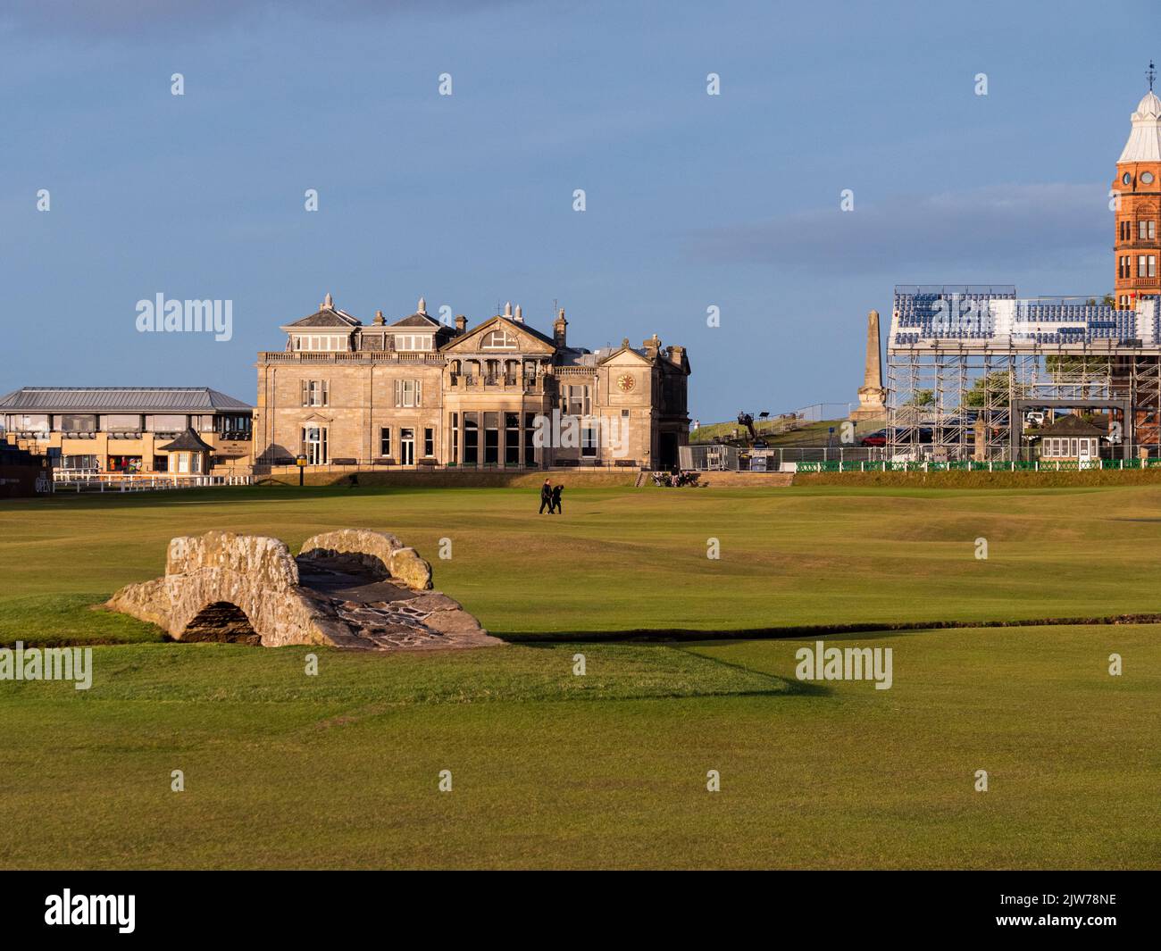 A medieval building in St Andrews, Scotland with a wide green field in ...