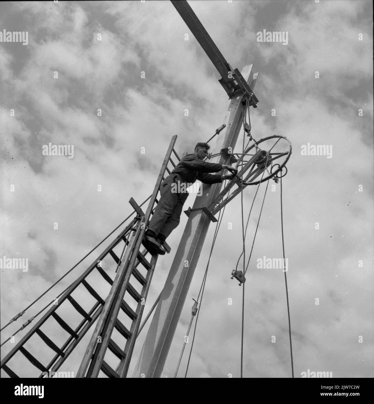 Image of placing a bullet at an overhead pipe portal in Wouw, during ...