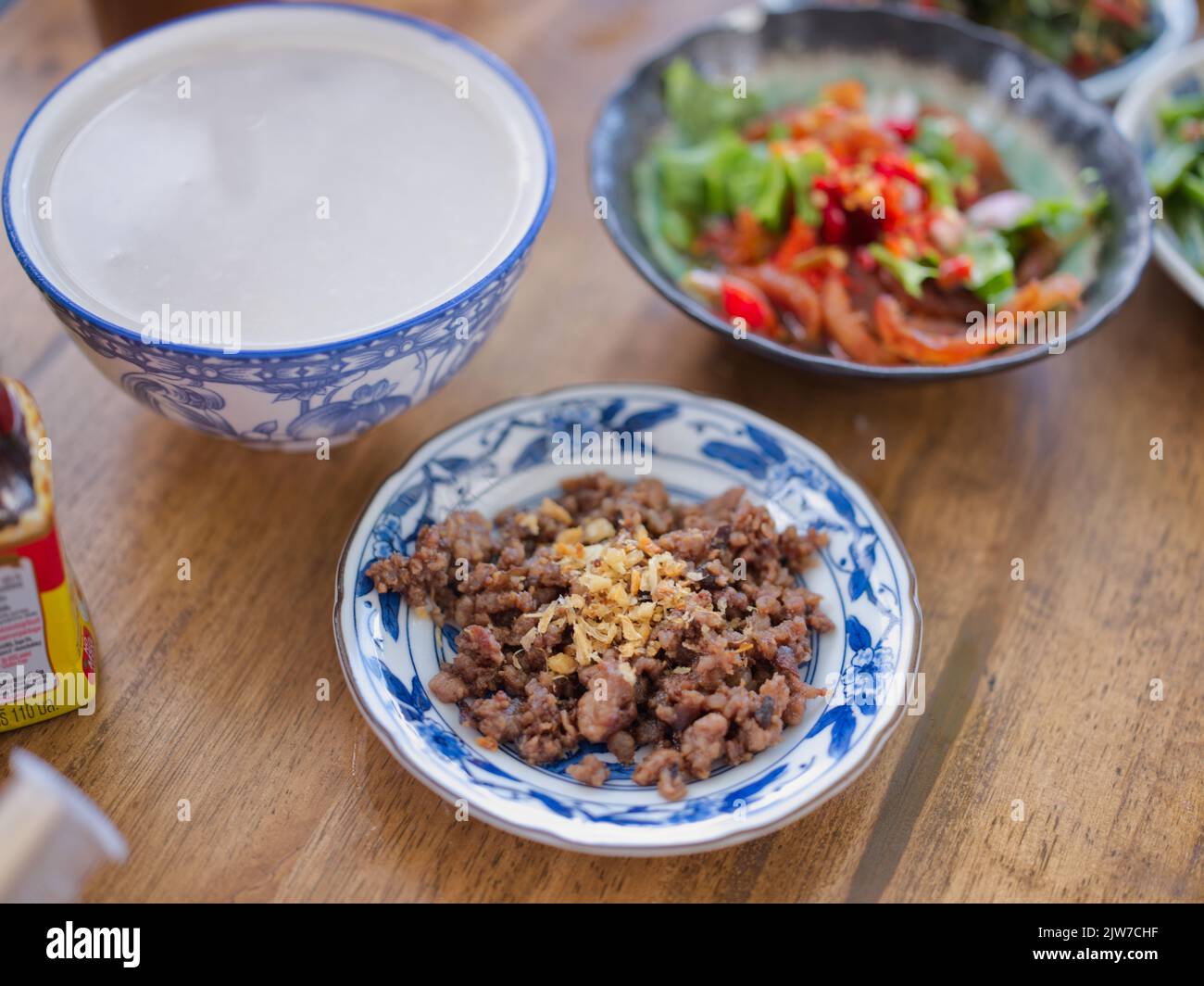Rice gruel and side dish . Concept breakfast THAI STYLE Stock Photo - Alamy
