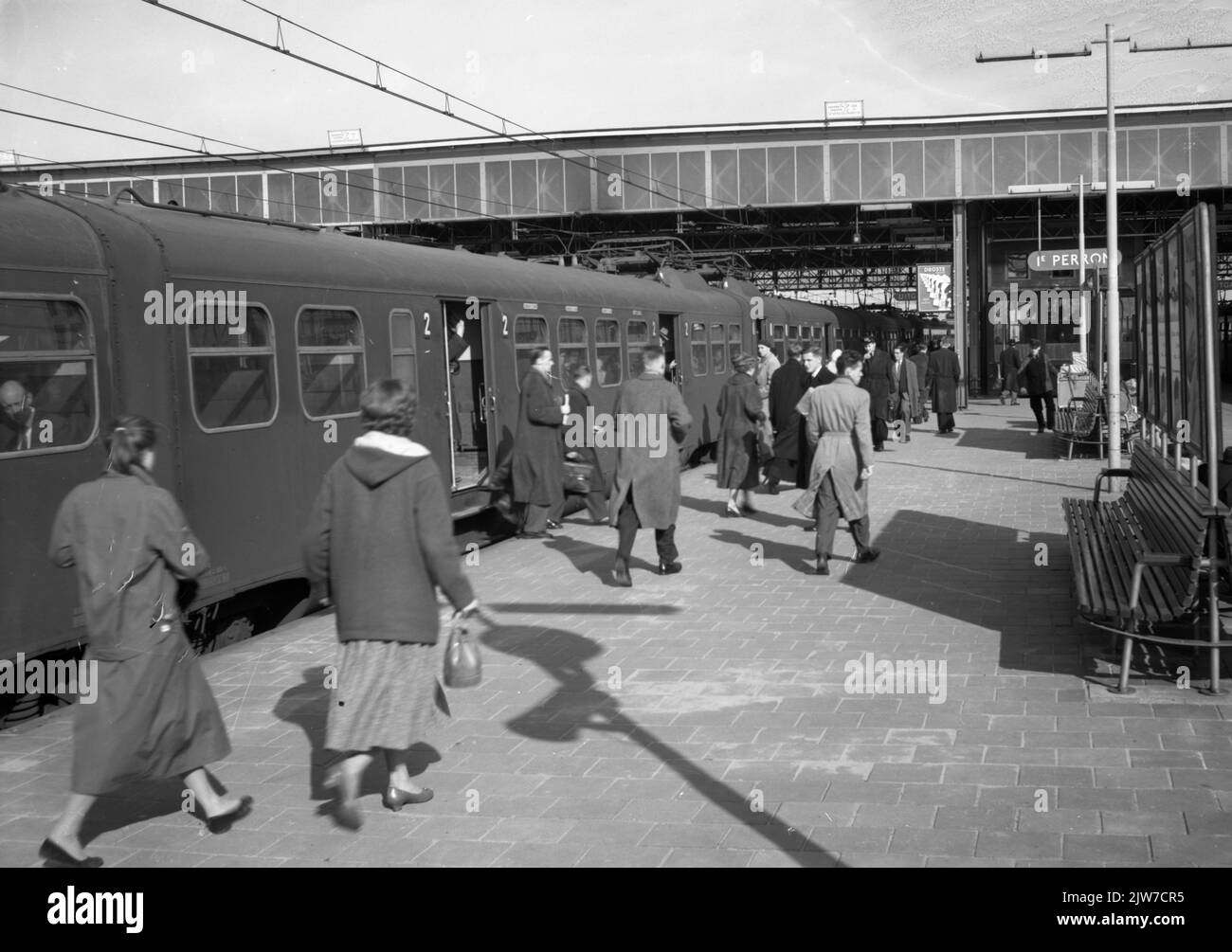 Image of travelers on the platform of the N.S. Station Station in ...