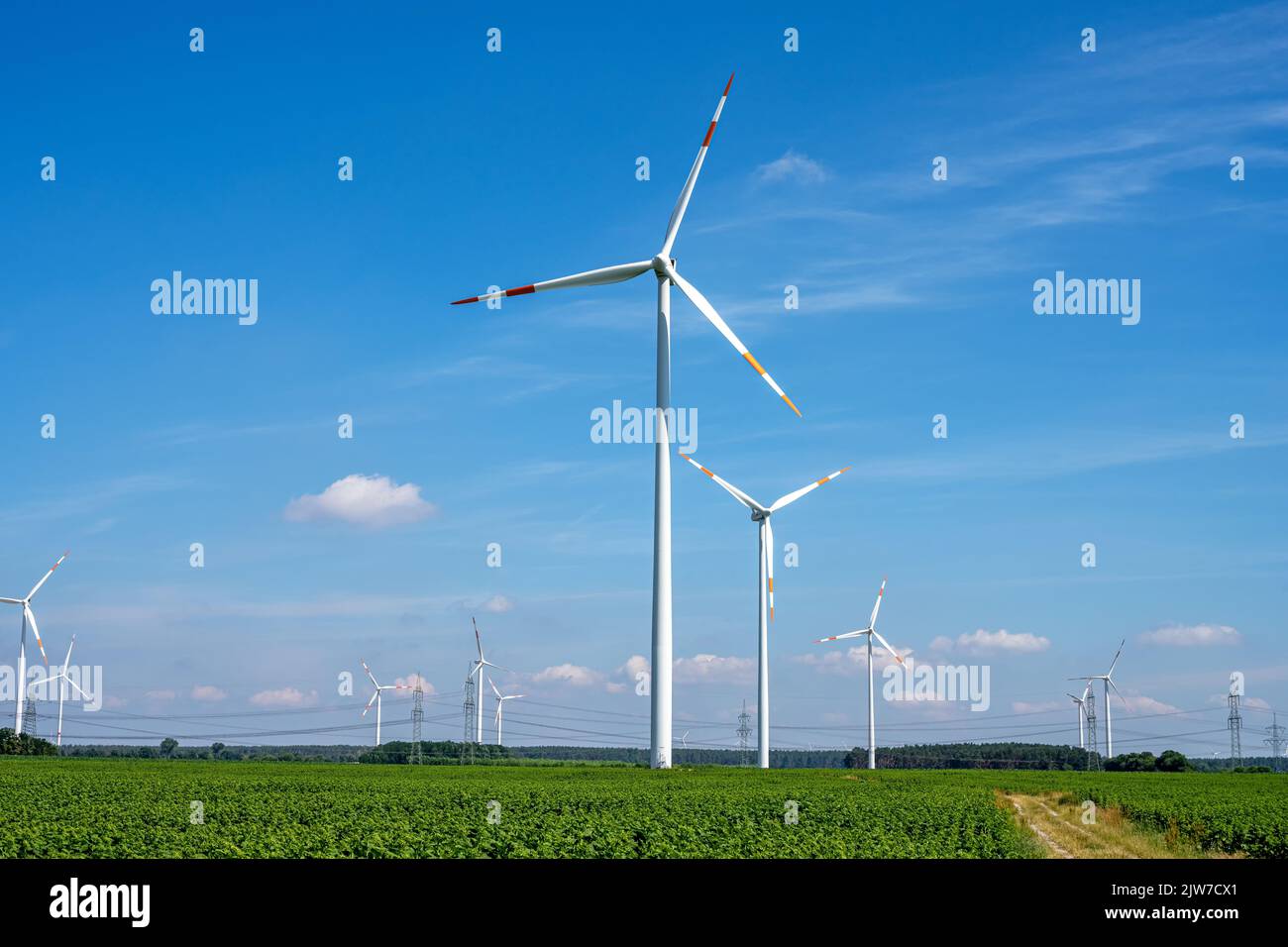 Wind energy plants between agricultural fields seen in Germany Stock ...