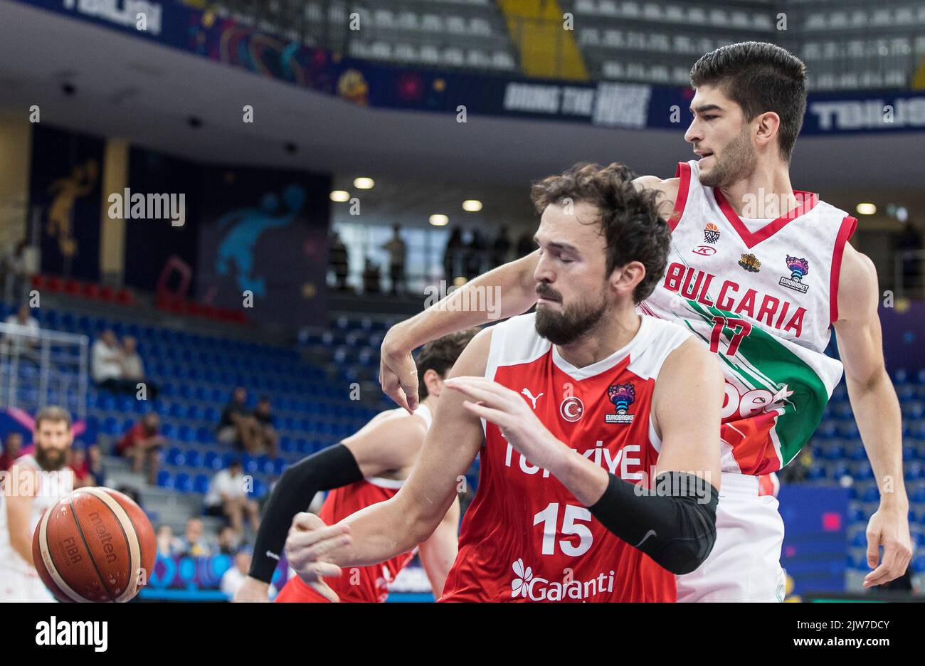 Sertac Sanli of Turkey competes against Emil Stoilov of Bulgaria under ...