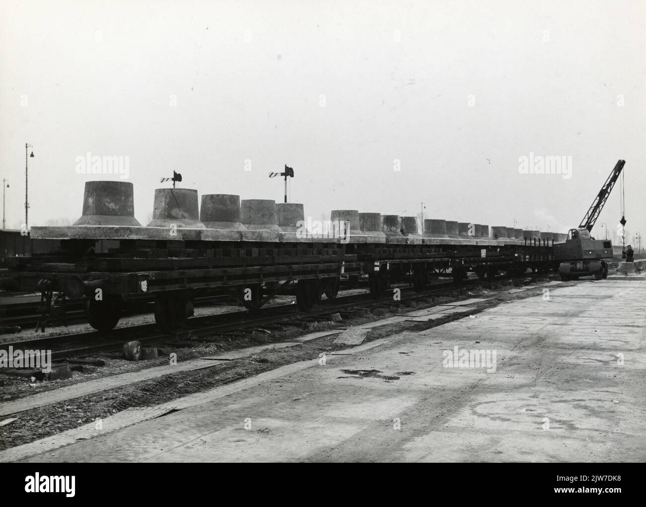 Image of the loading of freight wagons with concrete foundation blocks ...