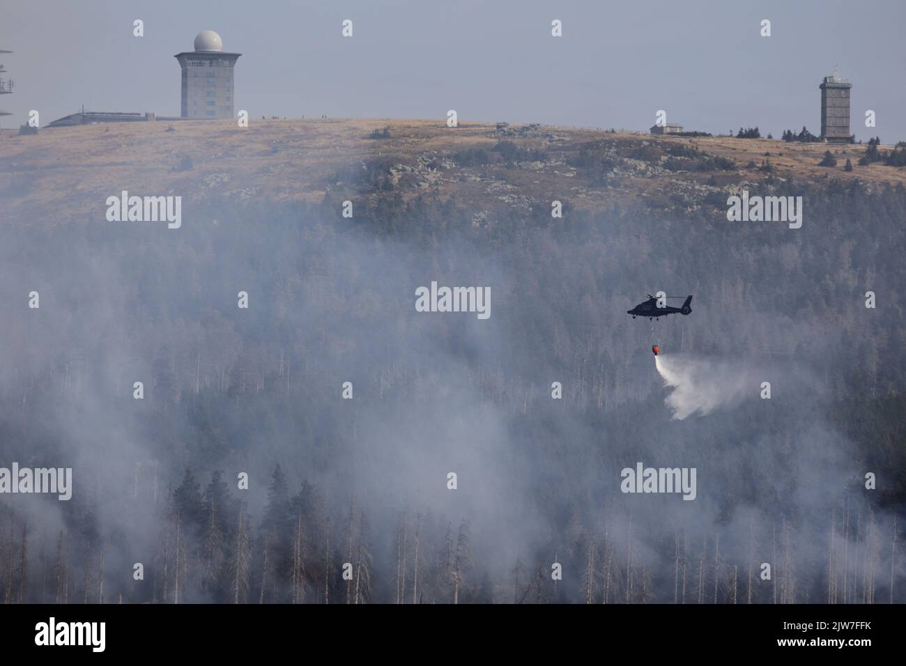 Schierke, Germany. 04th Sep, 2022. Firefighting helicopters are used to ...