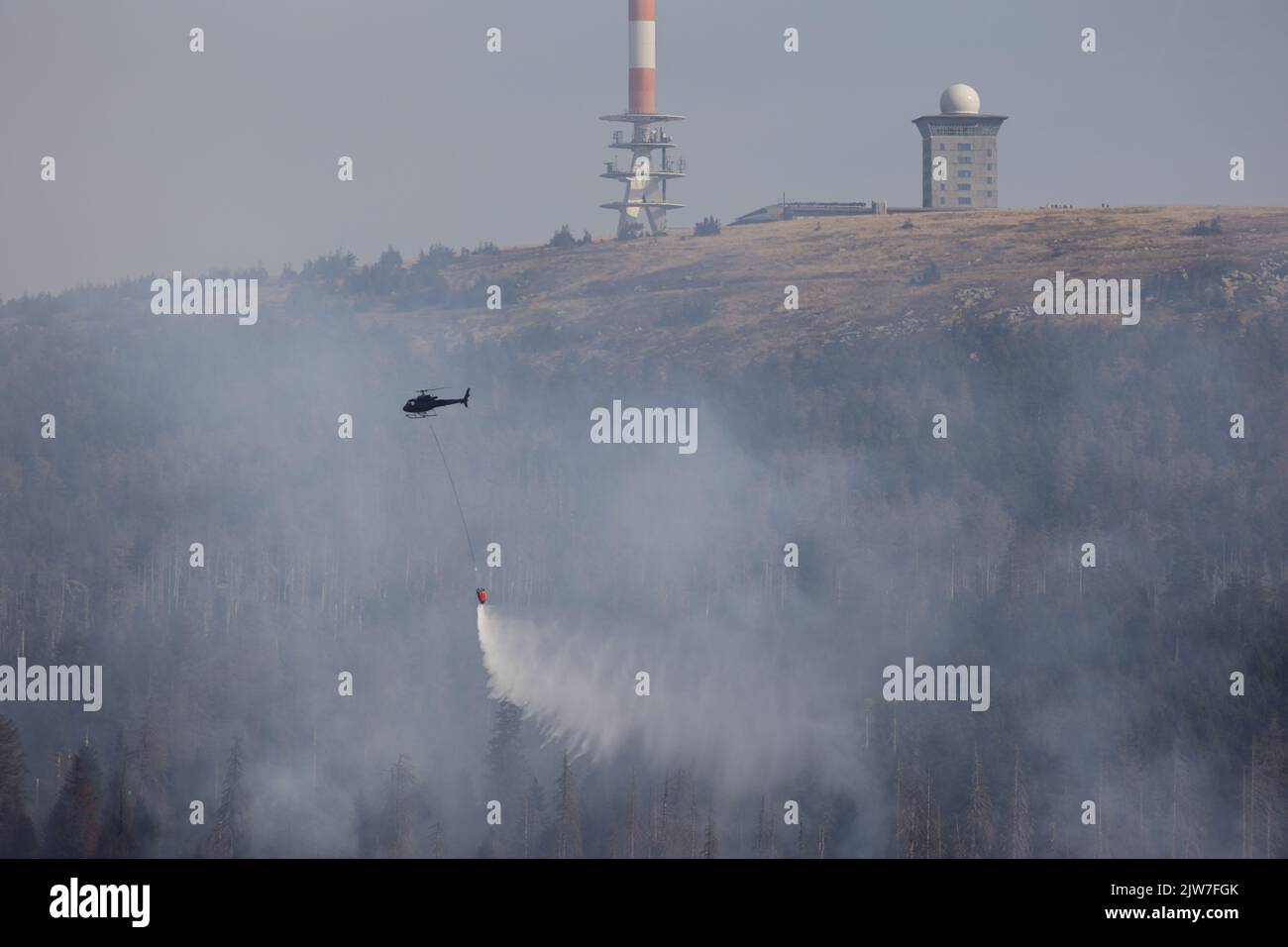 Schierke, Germany. 04th Sep, 2022. Firefighting helicopters are used to ...