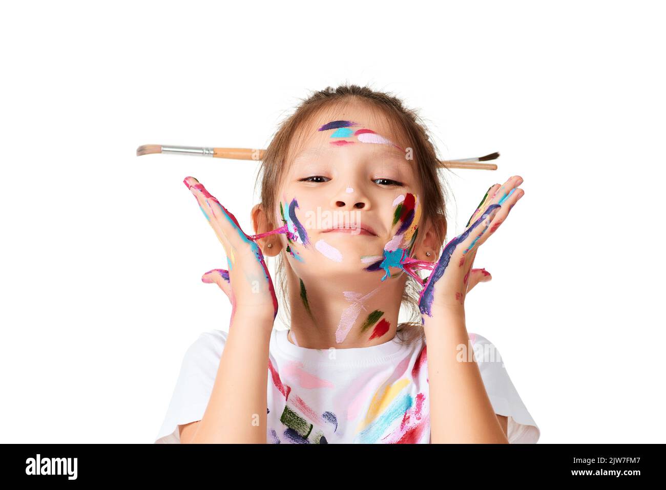 child girl in colorful paint with paintbrush in hair Stock Photo - Alamy