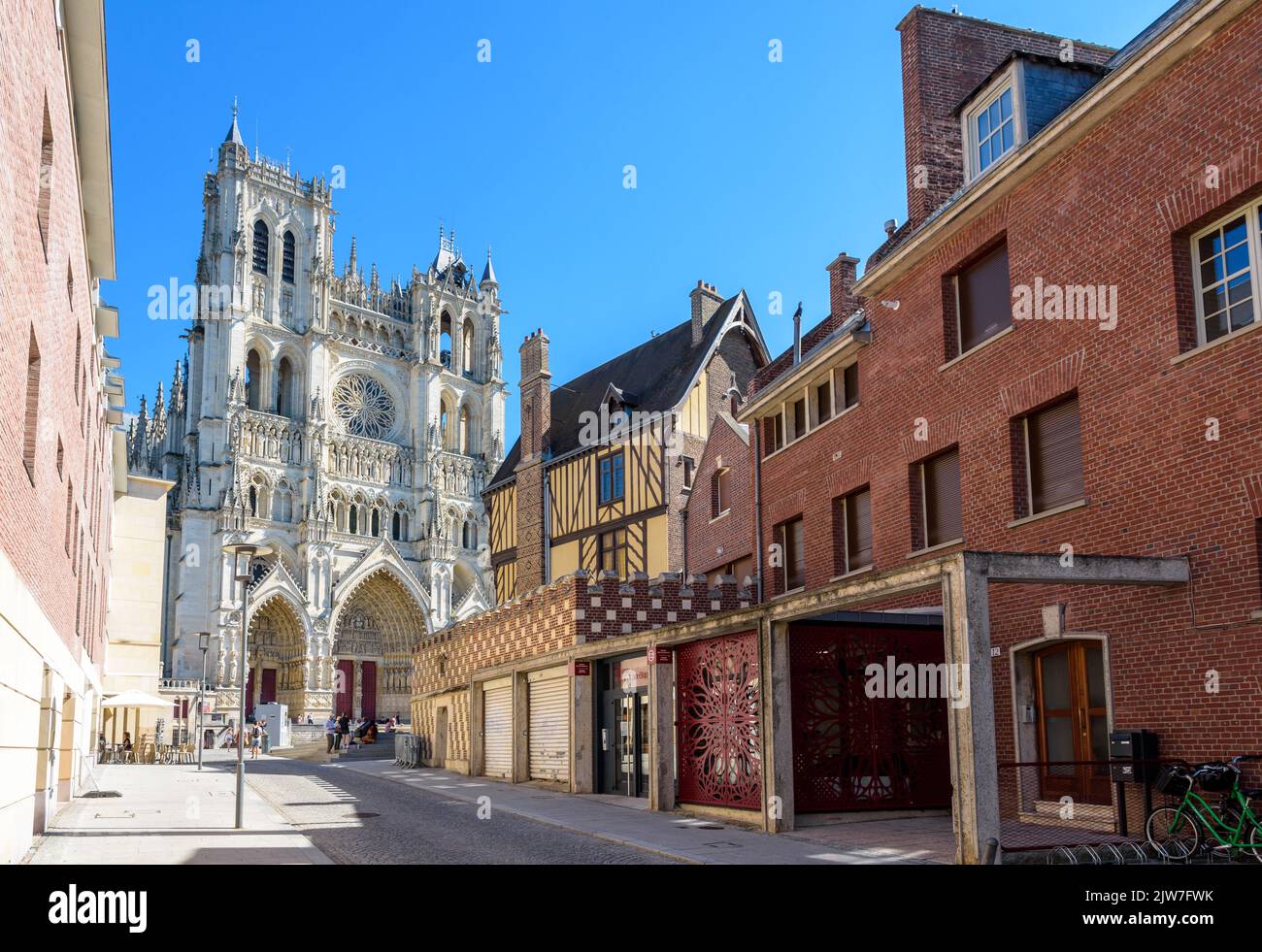 Gothic facade of Notre-Dame d'Amiens cathedral seen from a sloping ...