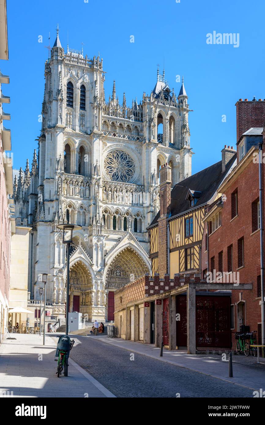 Gothic facade of Notre-Dame d'Amiens cathedral seen from a sloping ...