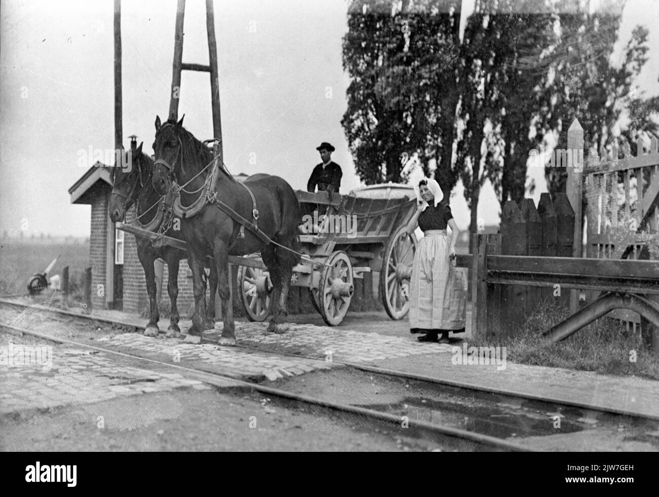 Image of a horse and carriage with two people in Zeeland traditional ...
