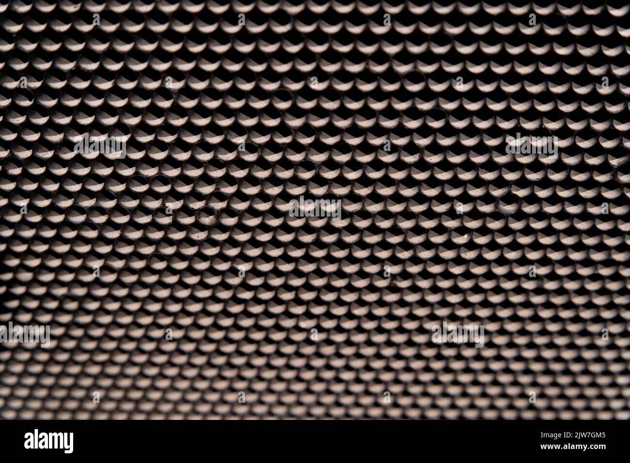 Metal mesh grid with circular perforated holes pattern in perspective ...