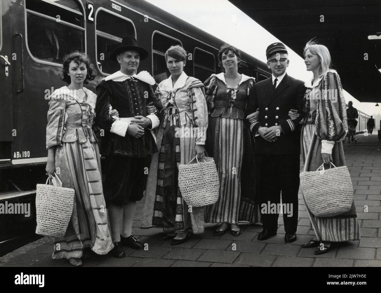 Image of the costumed hostesses and the train staff from the extra ...