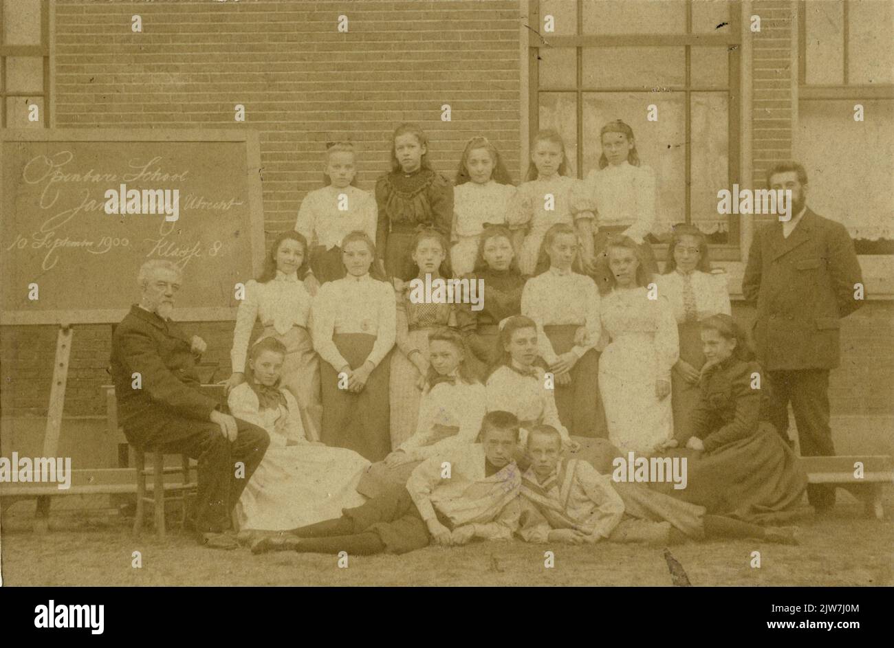 Group portrait of the students and teacher of class 8 of the Public ...