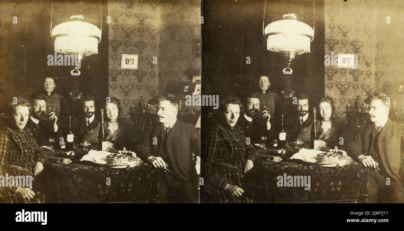 Image of members of the Hauer family in Utrecht around a table with ...