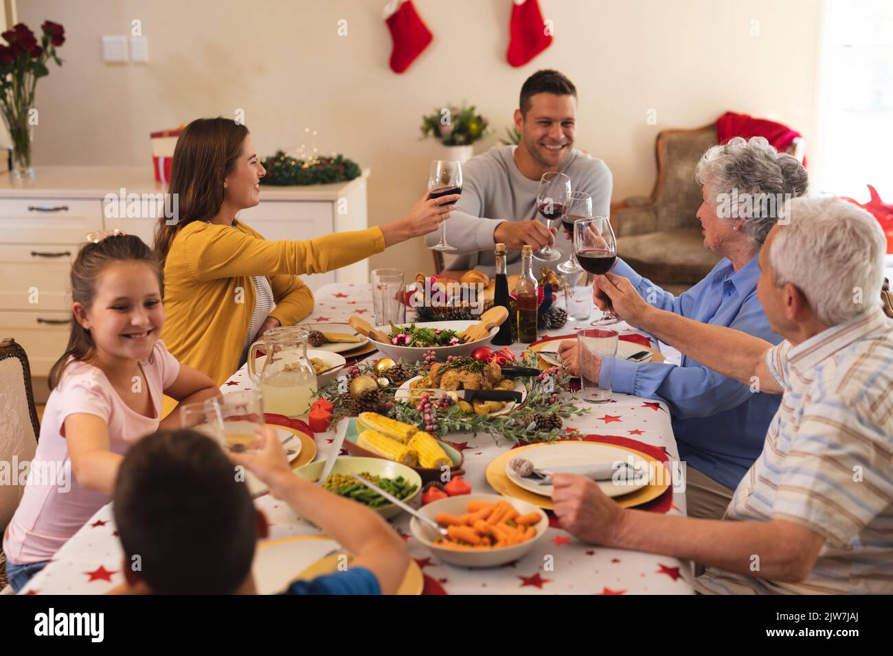 Family dinner table together hi-res stock photography and images - Alamy