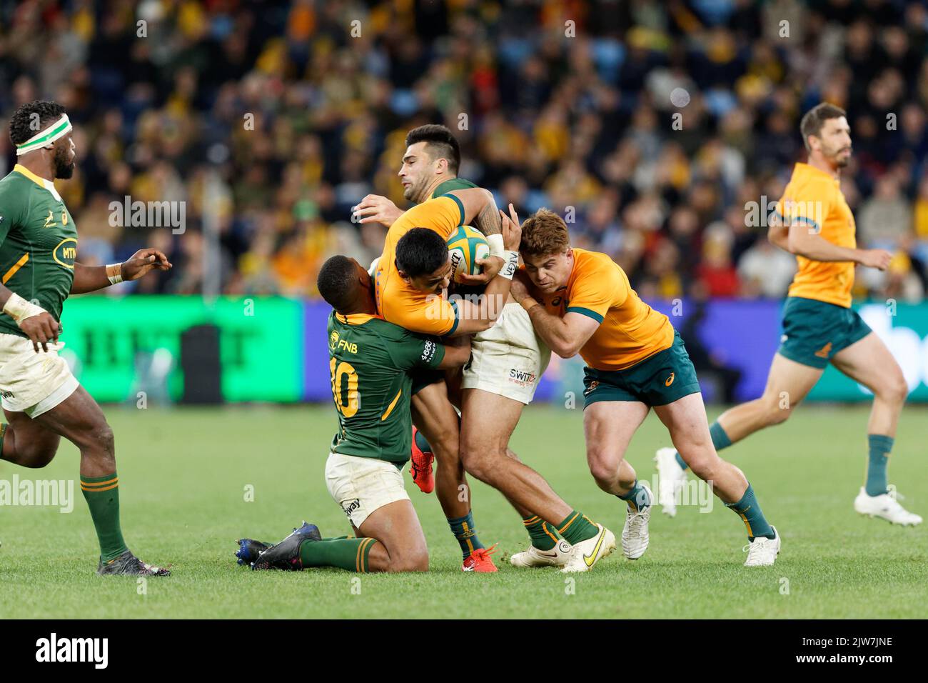 SYDNEY, AUSTRALIA - SEPTEMBER 3: Len Ikitau of Australia is tackled by ...
