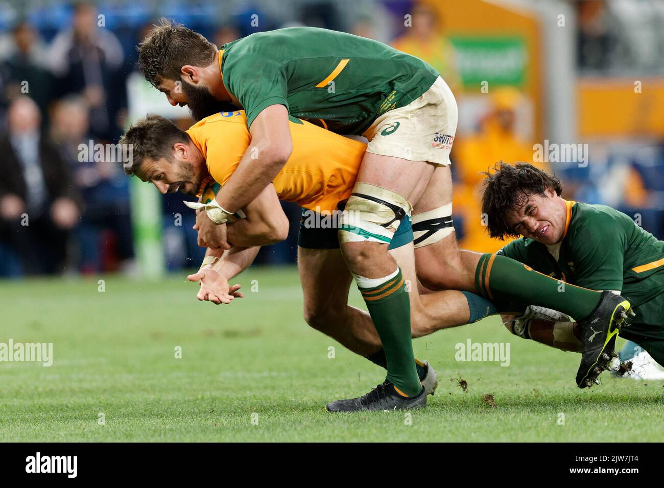 SYDNEY, AUSTRALIA - SEPTEMBER 3: Jake Gordon of Australia is tackled by ...
