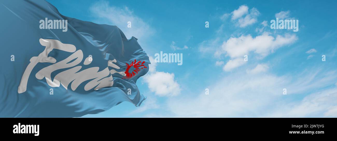 official flag of Flint, Michigan untied states of America at cloudy sky ...