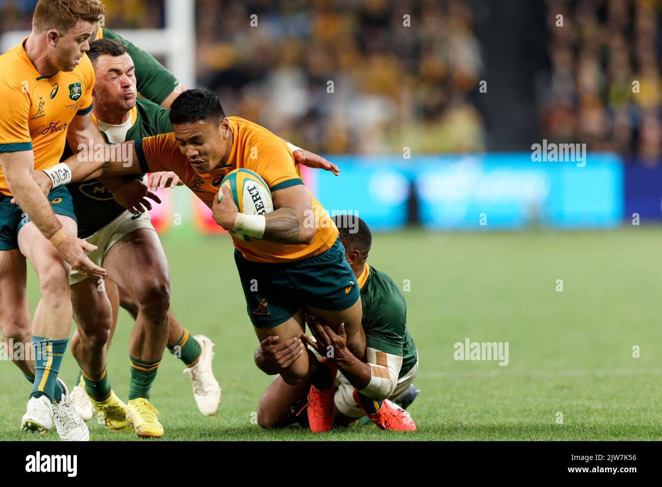 SYDNEY, AUSTRALIA - SEPTEMBER 3: Len Ikitau of Australia is tackled by ...