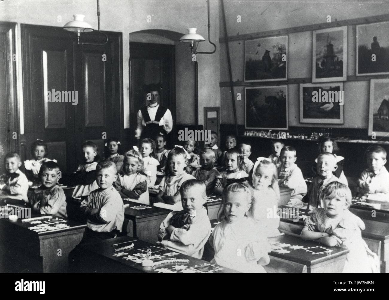 Group portrait of the class of Miss S. Westerhof (background) in the ...