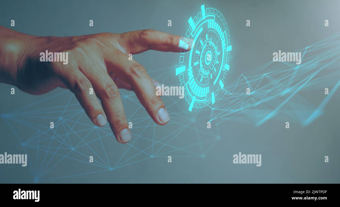 Businessman hand pointing Hud futuristic element technology setting is ...