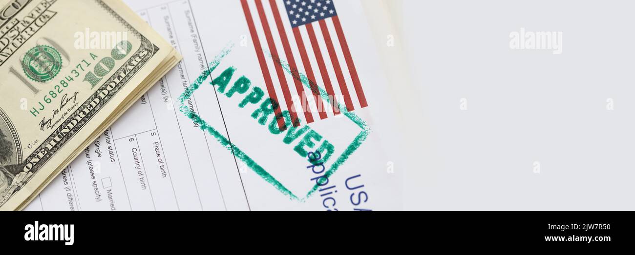 Stamp approved is on documents for obtaining American visa closeup ...
