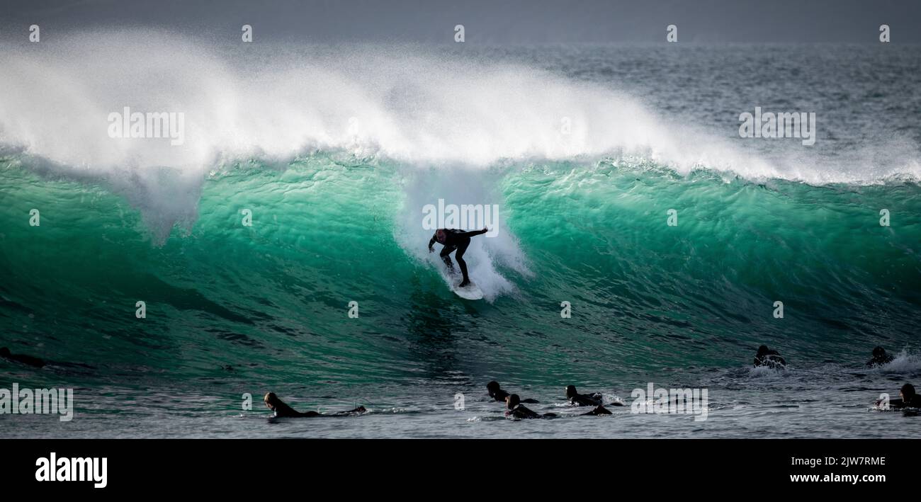 Surfers captured riding the best waves in Cornwall on Porthleven reef ...