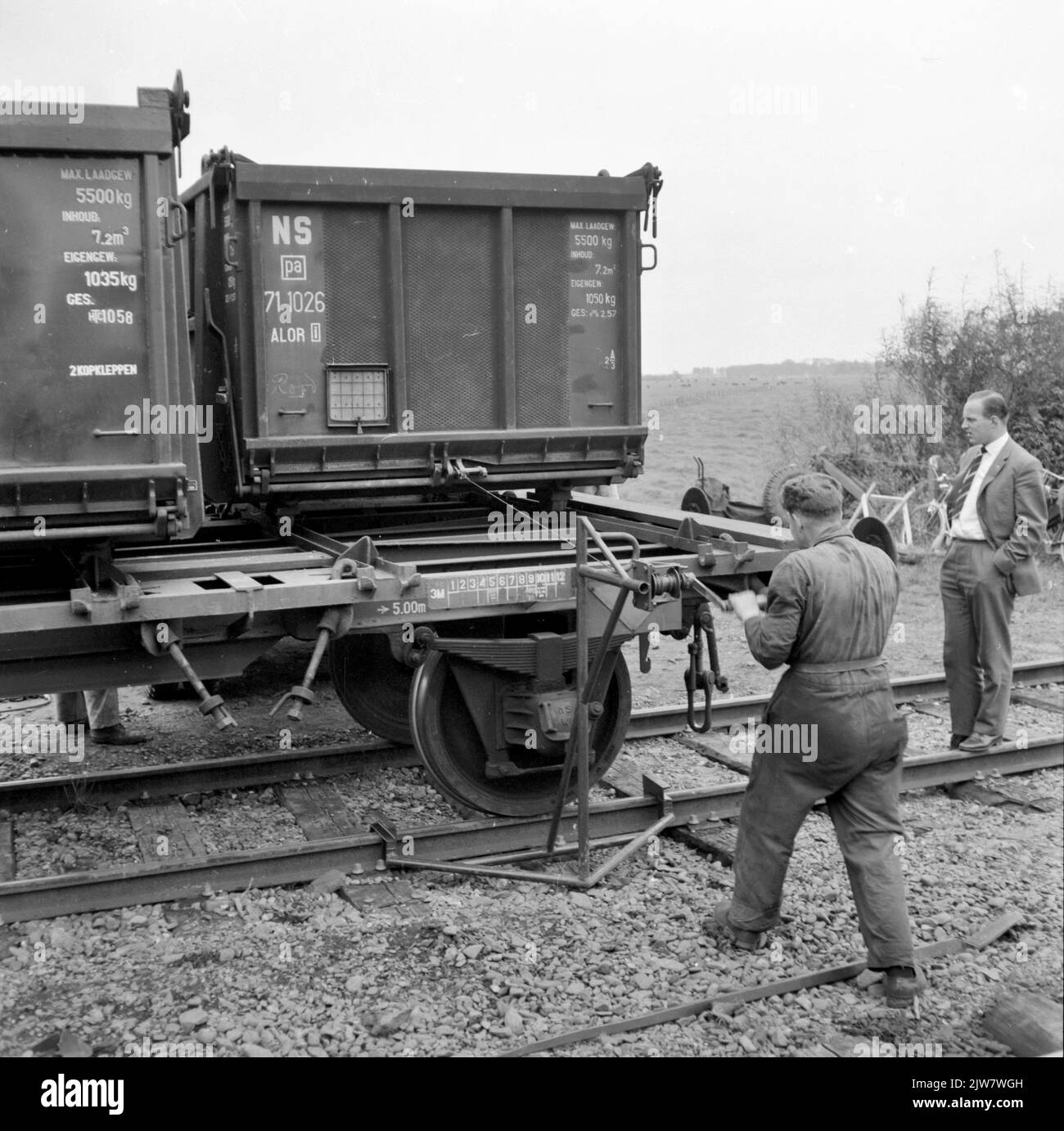 Image of pouring stones from a car loading box of the N.S. in Baflo ...