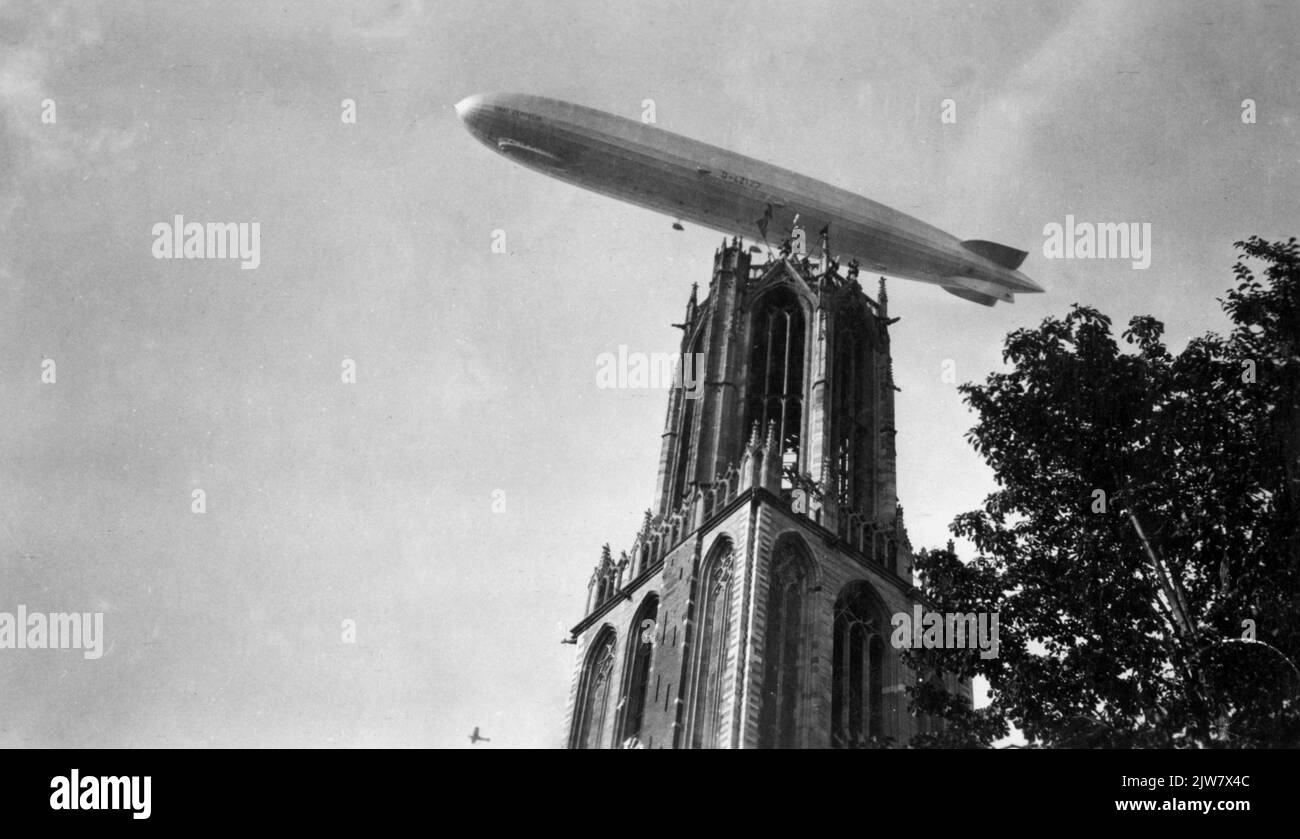 Image of the German airship De Graf Zeppelin and the Dom Tower in ...