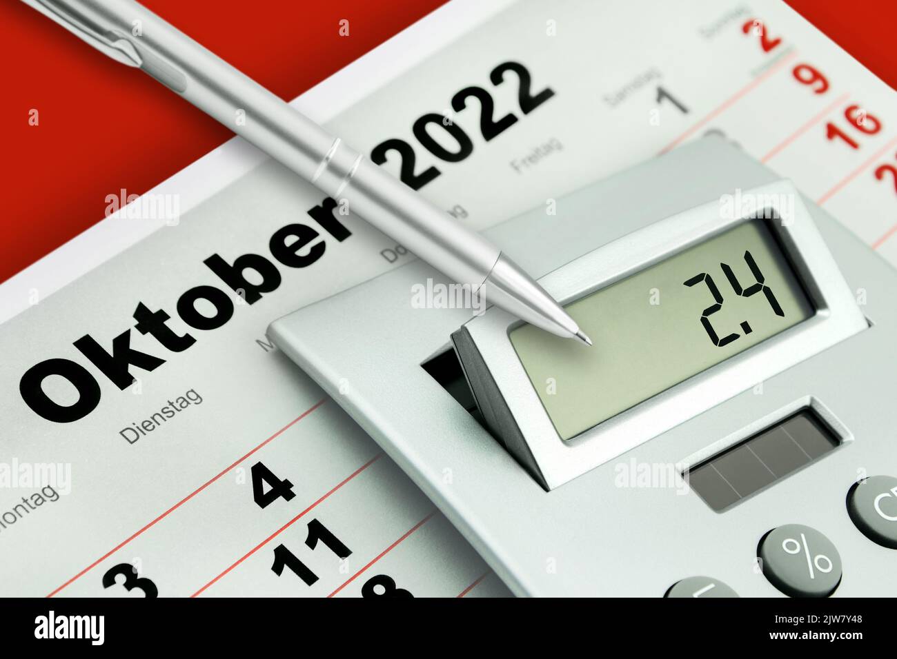 German calendar October 2022 and calculator with 2,4 Cent Stock Photo ...