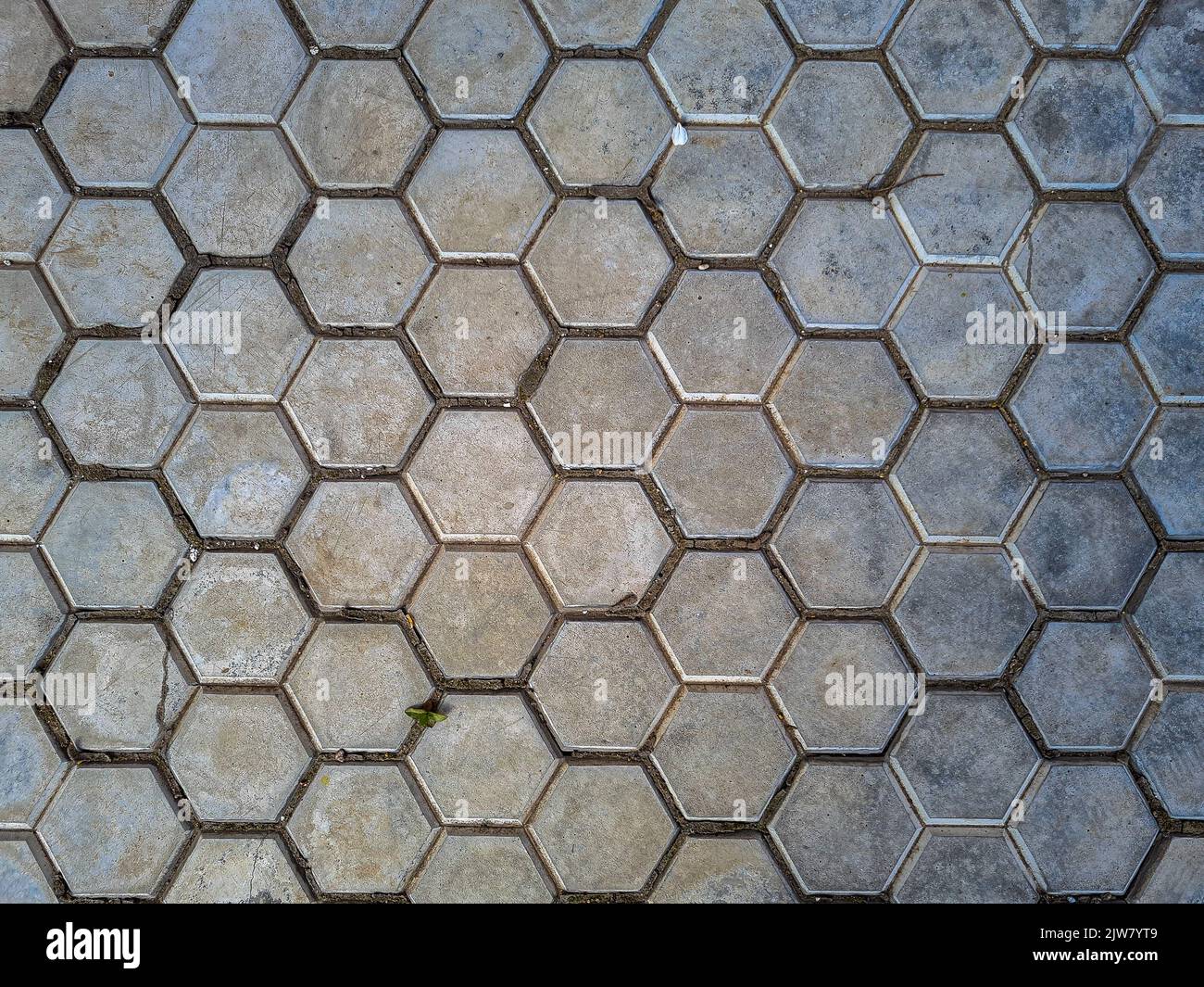 Street hexagonal clay tiles Hexagon honey comb pattern background texture Stock Photo - Alamy