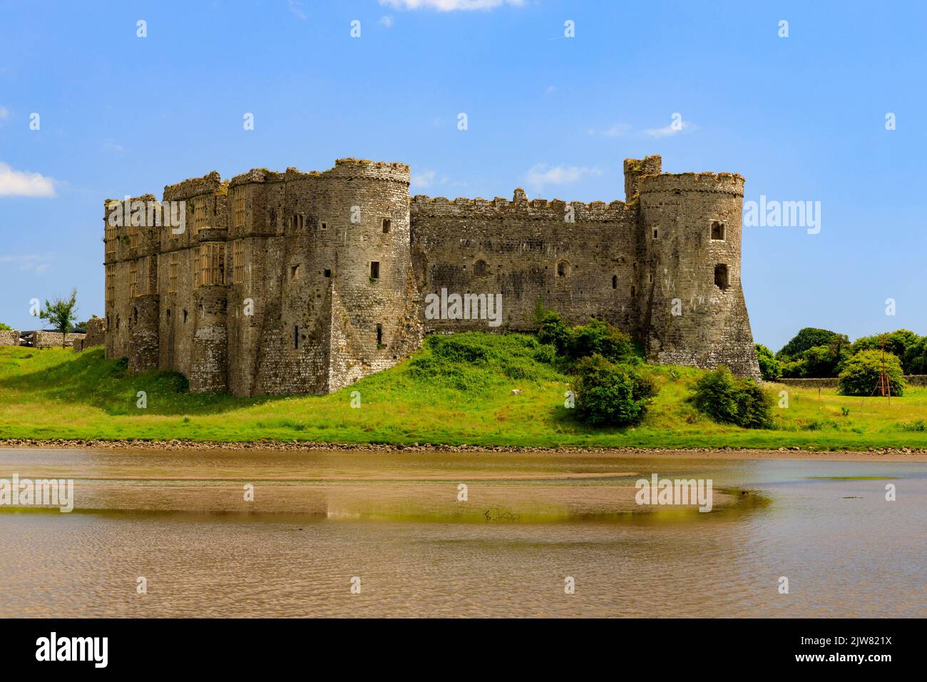 The 13th century Carew Castle ruins on the banks of the Carew River ...