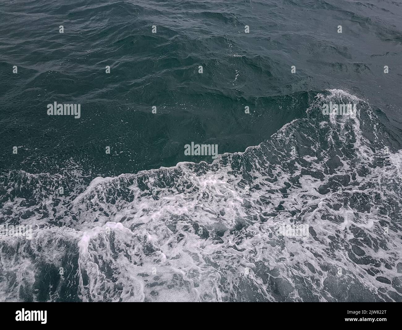 Surface of blue water Sea wave Colored background Stock Photo - Alamy