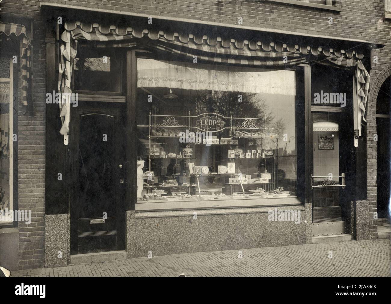 View of the shop front of Winkel no. 1 of the "Lubro Brood- en Confarus ...
