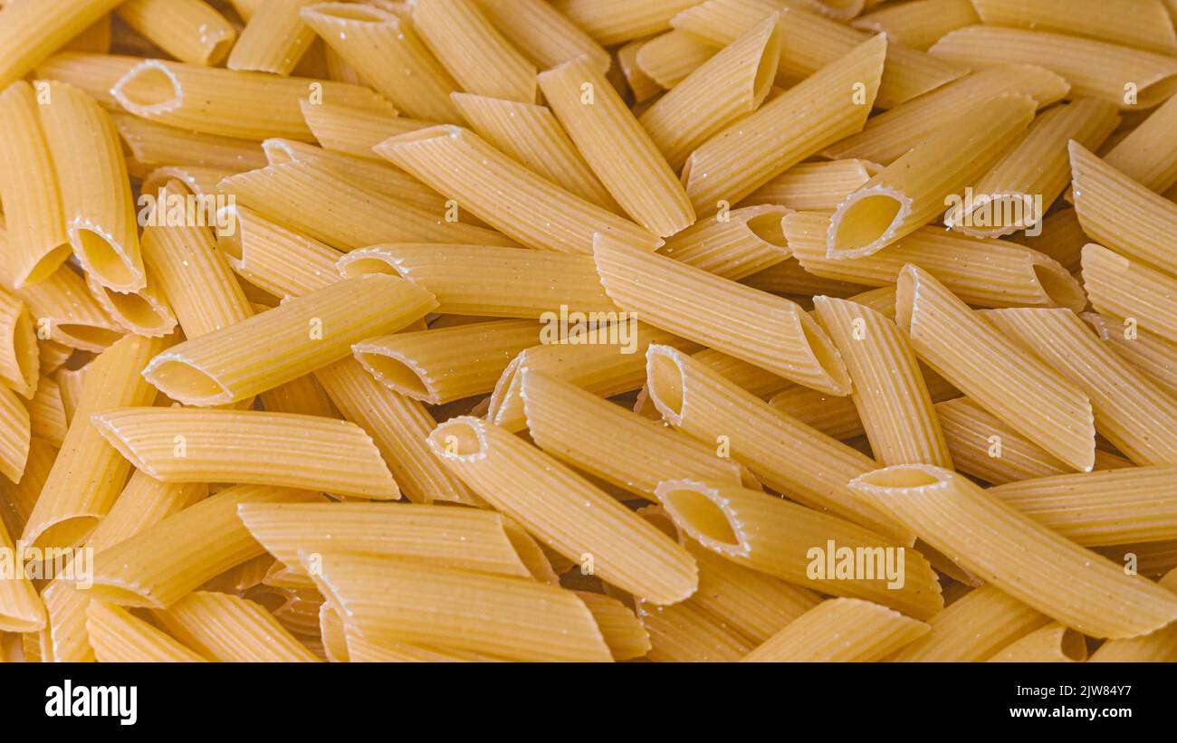 Dry Italian pasta background healthy food photo Top view Close-up Stock ...