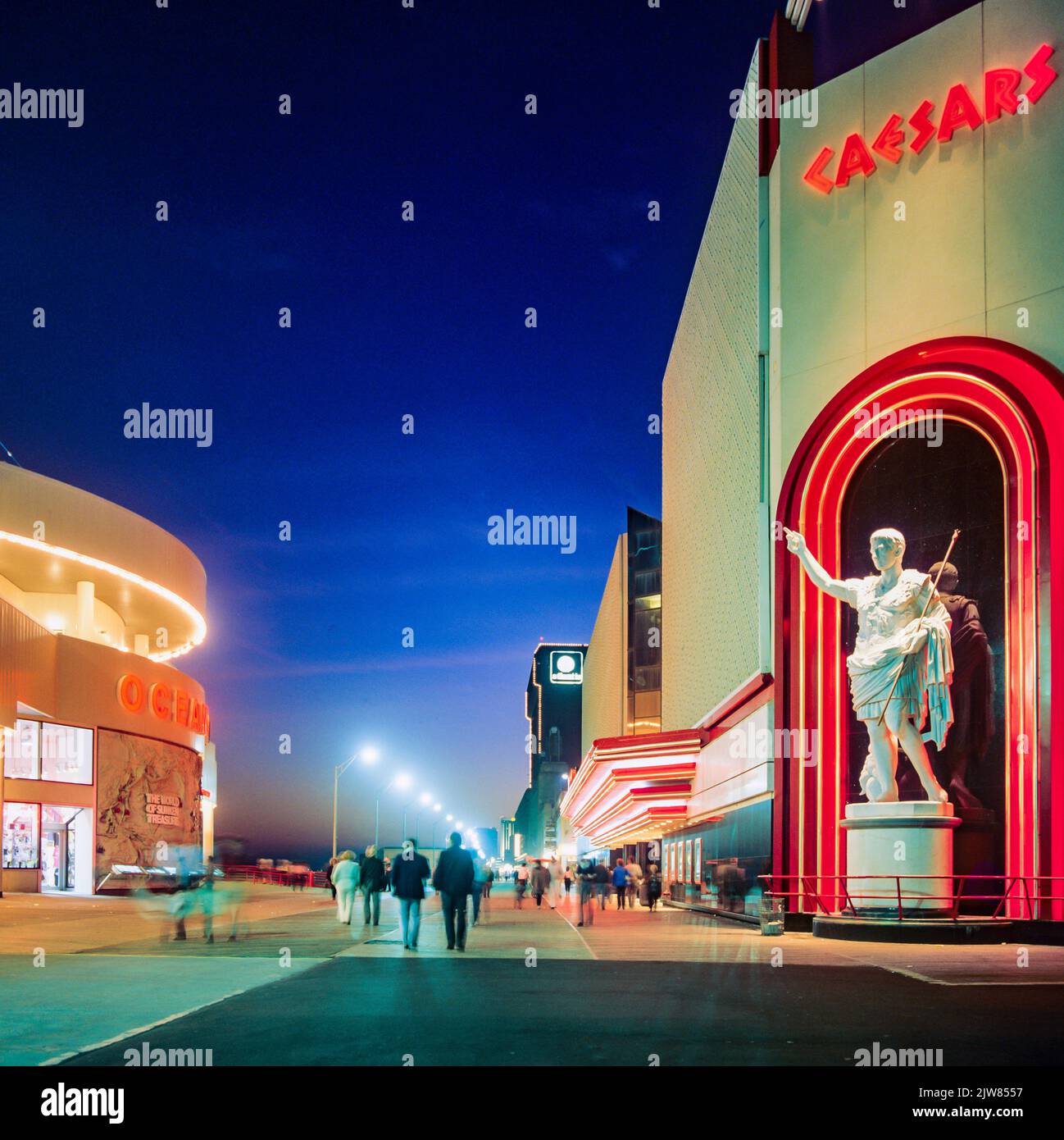 Atlantic City, 1980s, Caesars hotel casino statue, people stroll on ...