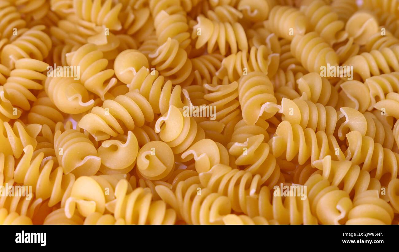 Dry Italian pasta background healthy food photo Top view Close-up Stock ...