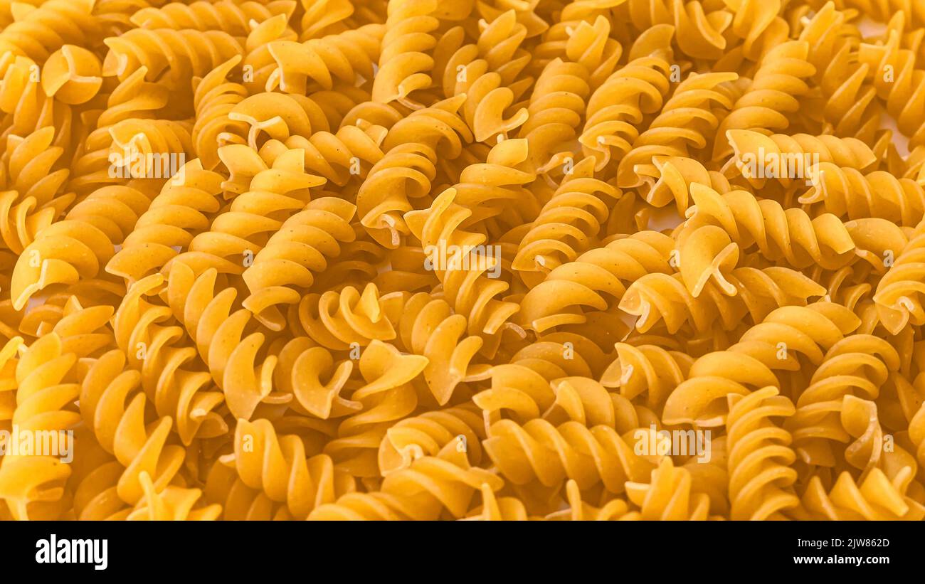 Dry Italian pasta background healthy food photo Top view Close-up Stock ...