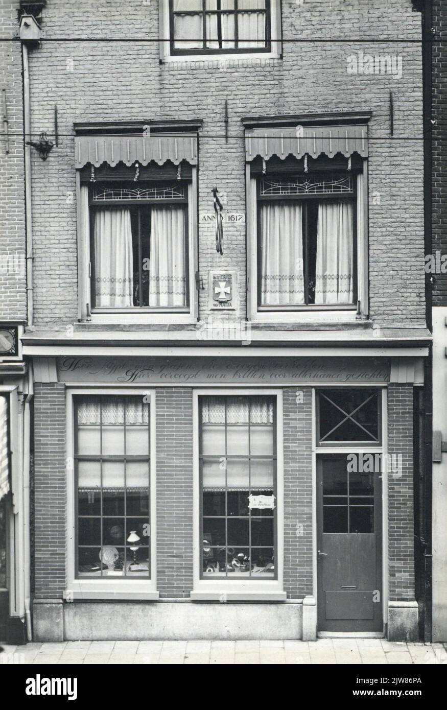 View of the facade of the optician and photo shop Lammerts van Bueren ...