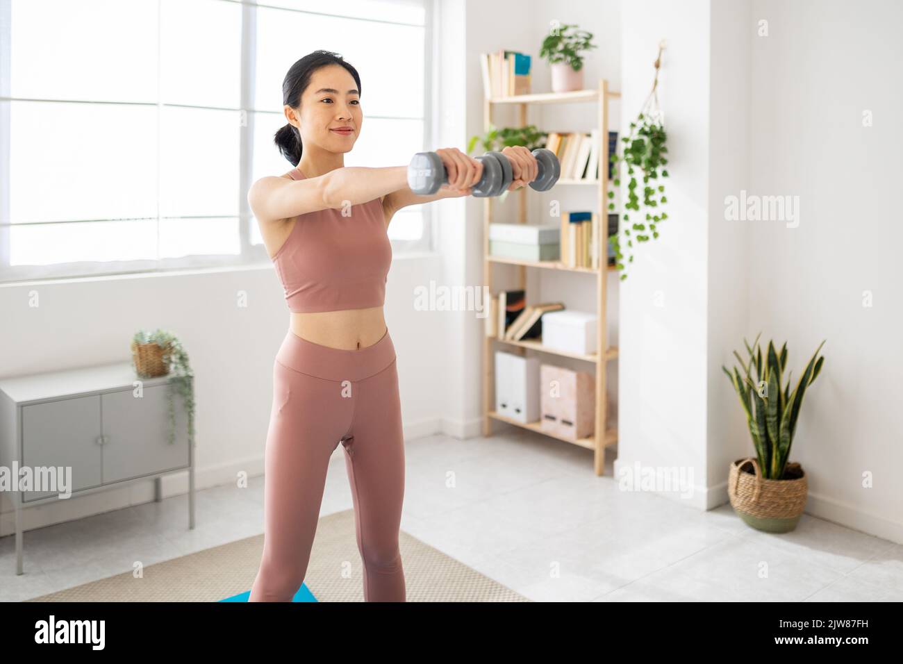 Asian girl workout exercise hi-res stock photography and images - Alamy
