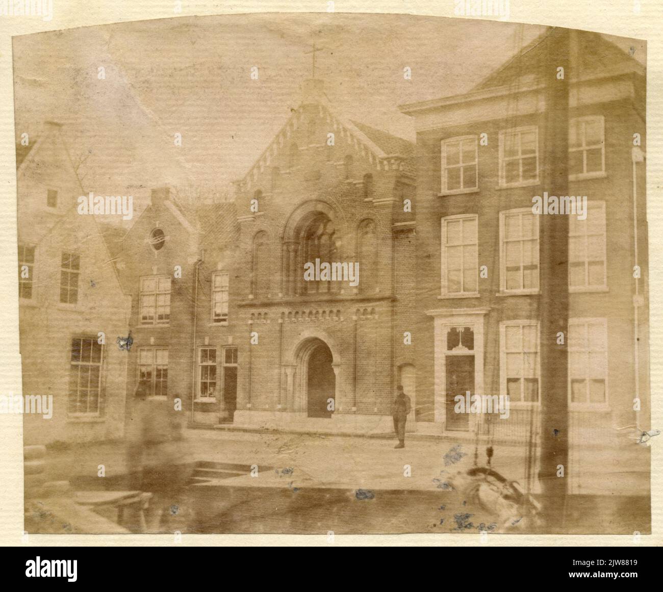 Old Catholic church with parsonage. recto Stock Photo - Alamy