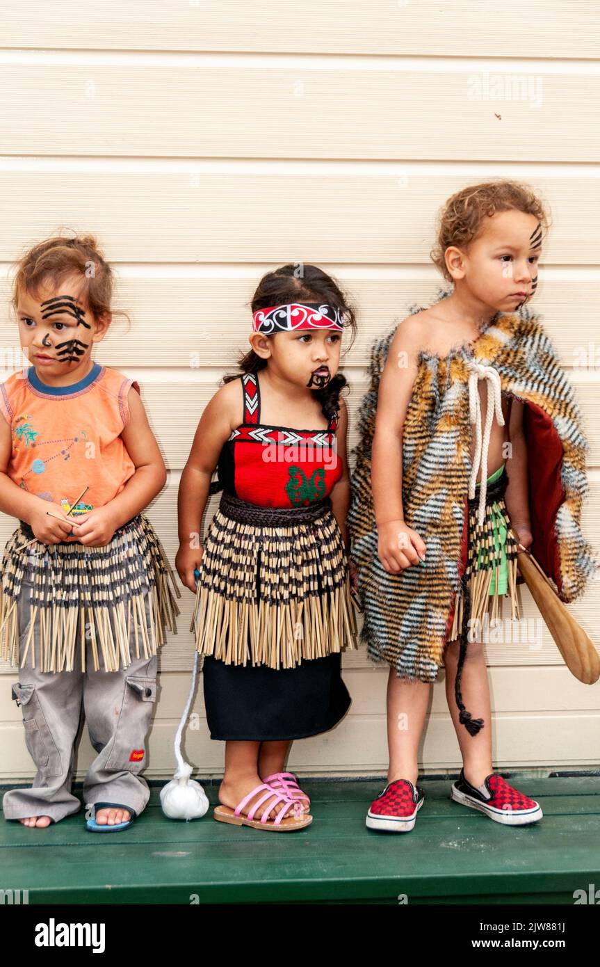 A small group of Maori children dressed in their traditional dance ...