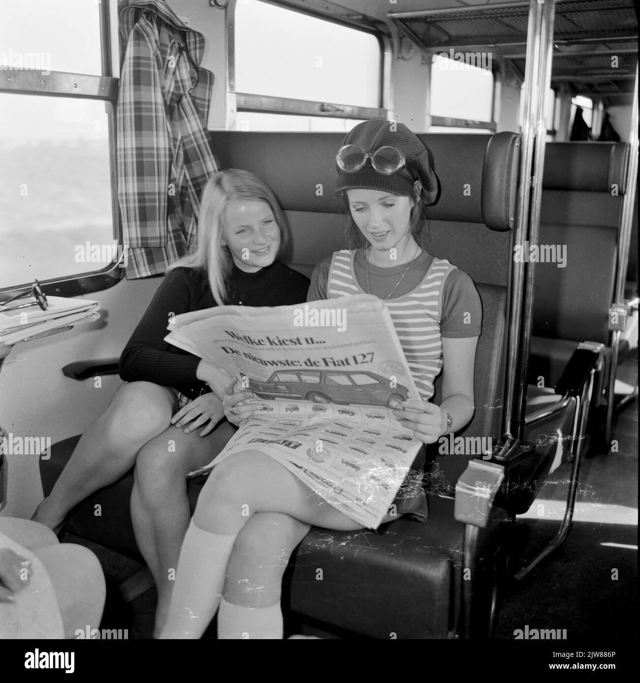 Image of two young women in a train Stock Photo - Alamy