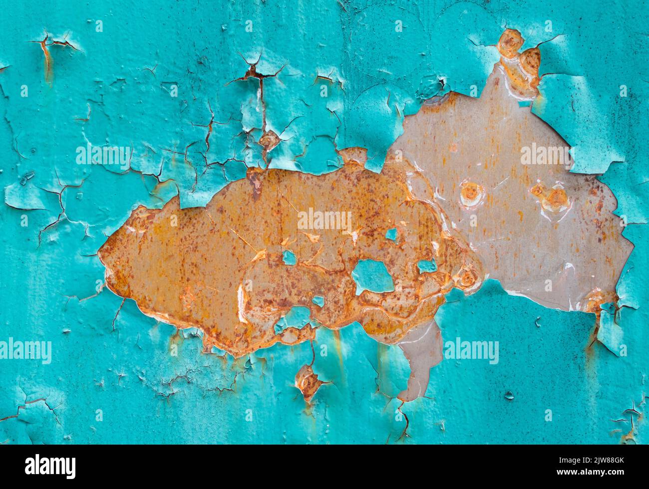 Brown rust with peeling blue paint on old metal fence Stock Photo - Alamy