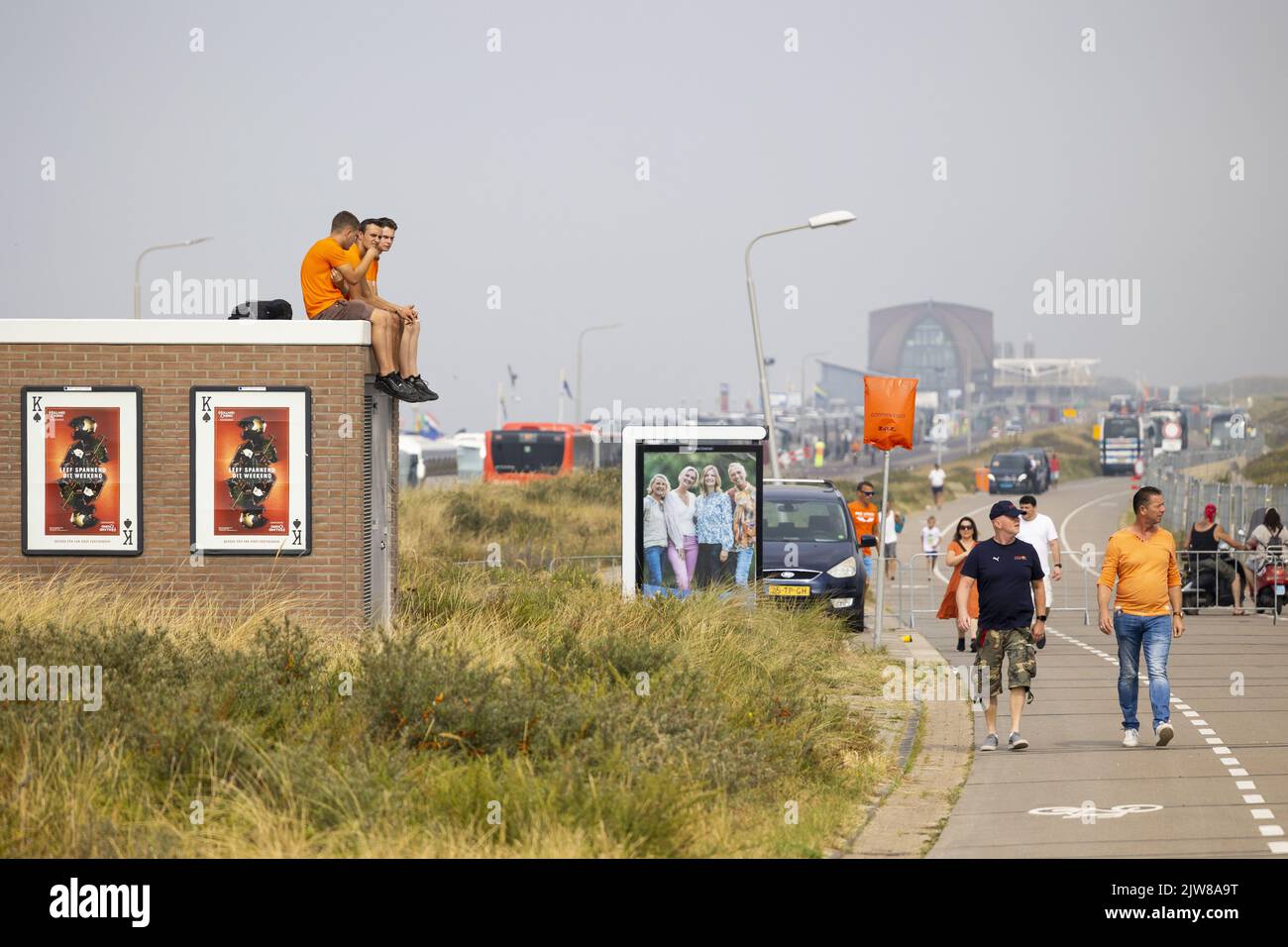 ZANDVOORT - Race fans watch the Zandvoort circuit from a rooftop where ...