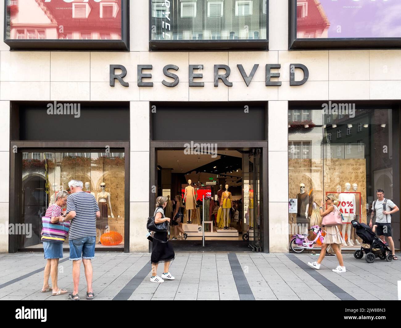 Reserved sign at a Reserved store in Munich town-center Stock Photo - Alamy