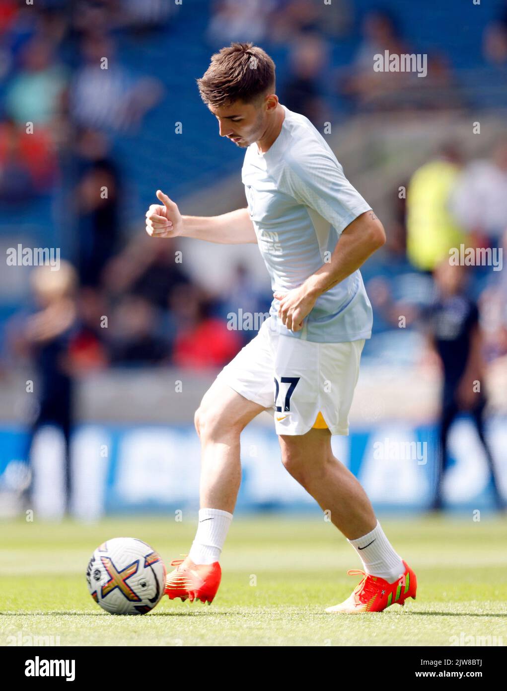 Brighton and Hove Albion's Billy Gilmour warms up on the pitch before ...
