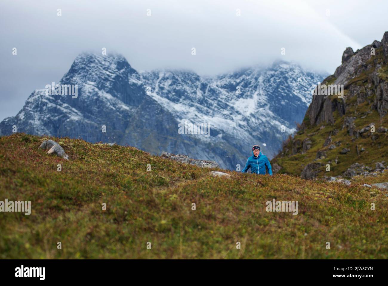 A runner in Lofoten, Norway Stock Photo - Alamy
