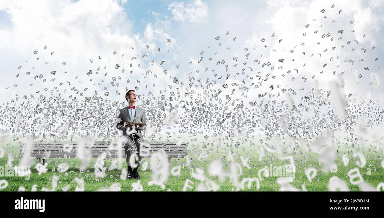 Young businessman or student studying the science and symbols fly ...