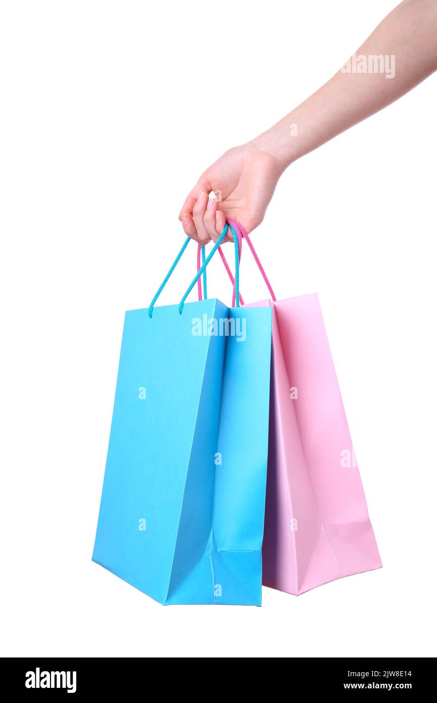 Hand holding colorful paper bags isolated on white background shopping ...
